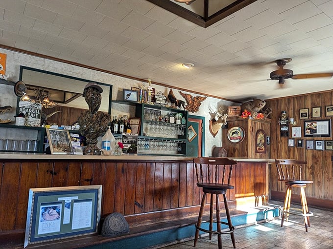 The bar area showcases decades of memorabilia – each bottle, photo and trinket telling stories of meals and memories shared.
