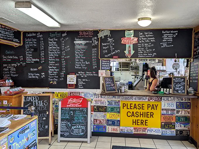 Where the magic happens – license plates below, handwritten menu above, and endless possibilities in between. Order here, thank yourself later.