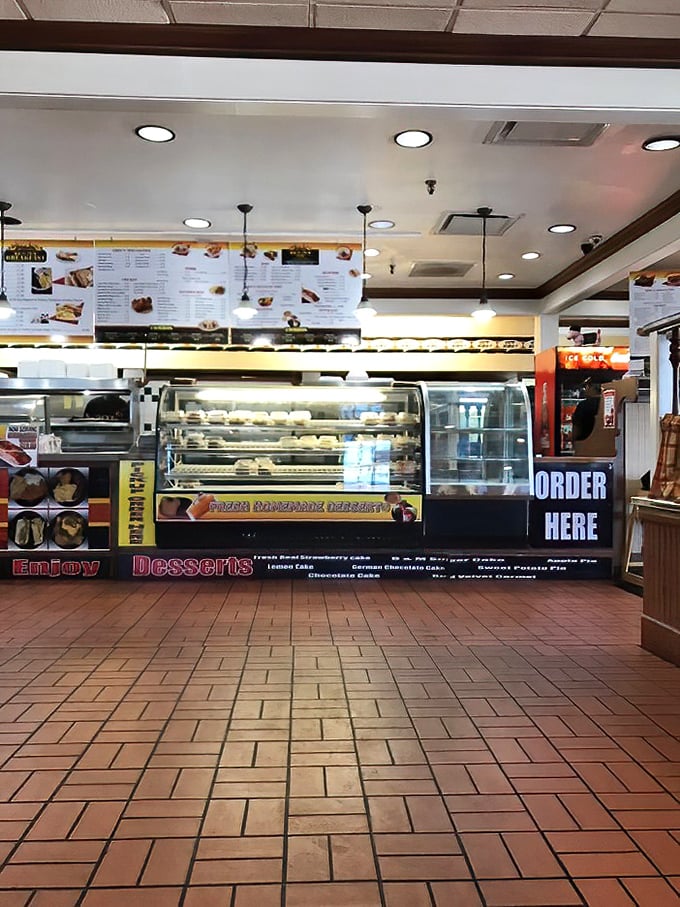A wall of customer photos tells the real story—this isn't just a restaurant, it's where memories are made between bites.