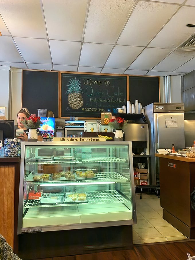The counter area showcases Quinn's motto on the chalkboard: "Family, Friends & Good Food!"—a philosophy served daily.