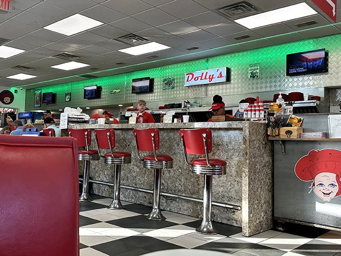 The counter seats aren't just dining spots—they're front-row tickets to the best show in town: breakfast made with practiced hands and hometown pride.