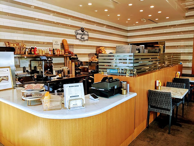 The command center where sandwich dreams become delicious reality - striped walls and all.
