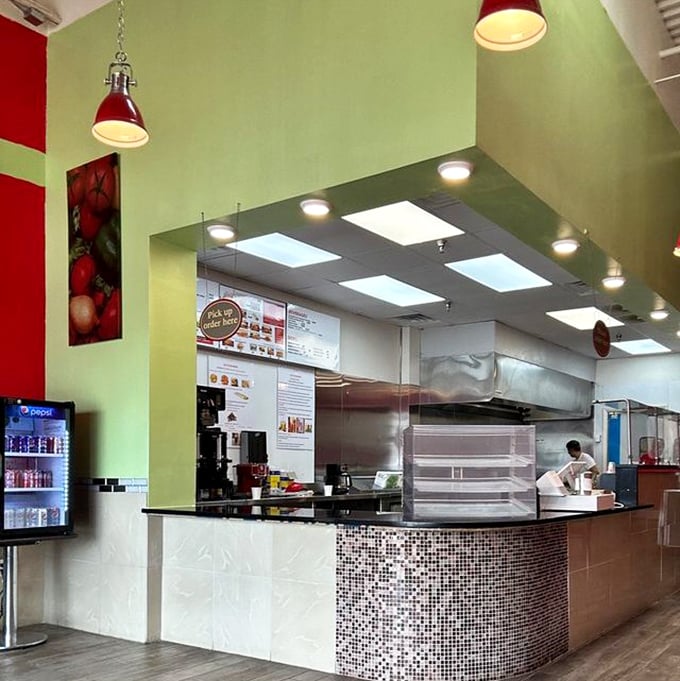 The open kitchen concept isn't just trendy—it's a statement of confidence. "Watch us work, we have nothing to hide and everything to showcase."