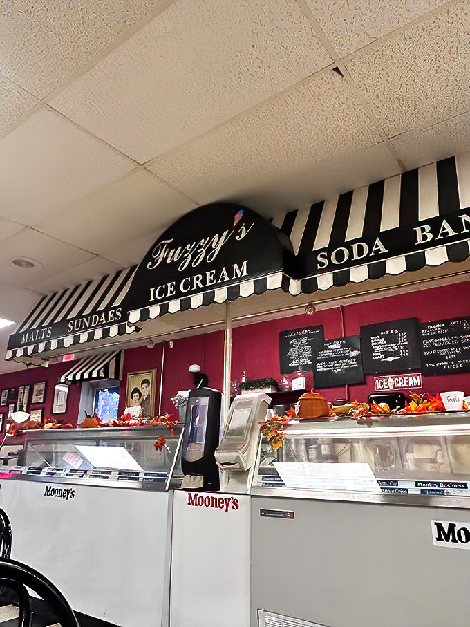 That striped awning over the ice cream counter isn't just decoration—it's a beacon of hope signaling that dessert is not just allowed, but encouraged.