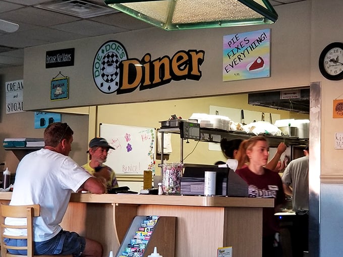 The counter seats—where solo diners find community and regulars exchange local wisdom between bites of toast.
