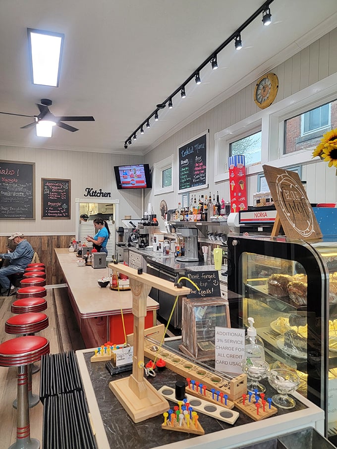 The counter and kitchen area buzz with activity, where breakfast magic happens in full view. No secrets here—just good, honest cooking.