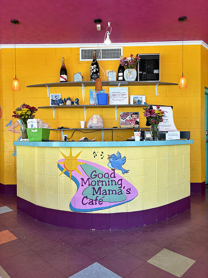 The counter area pops with color like a 1950s postcard come to life, complete with shelves of treasures and fresh flowers.