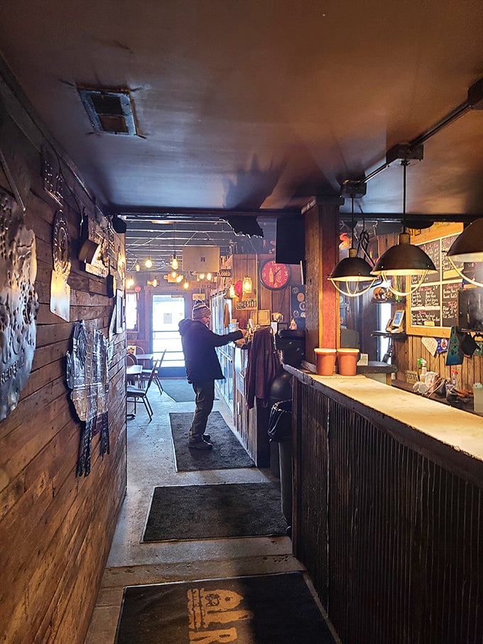 The narrow hallway to barbecue nirvana—where the aroma of smoking meat serves as your spiritual guide to the counter.