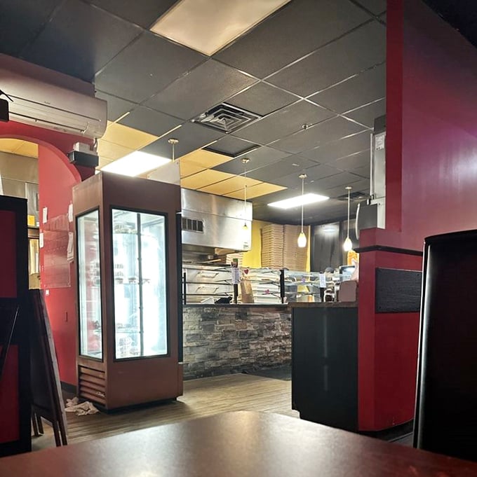 A glimpse into the heart of operations—where pizza dreams come to life amid the warm glow of pendant lights.