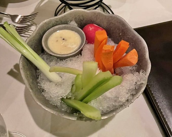 The crudité platter—that moment when raw vegetables in ice actually look exciting because the dipping sauce promises greatness.