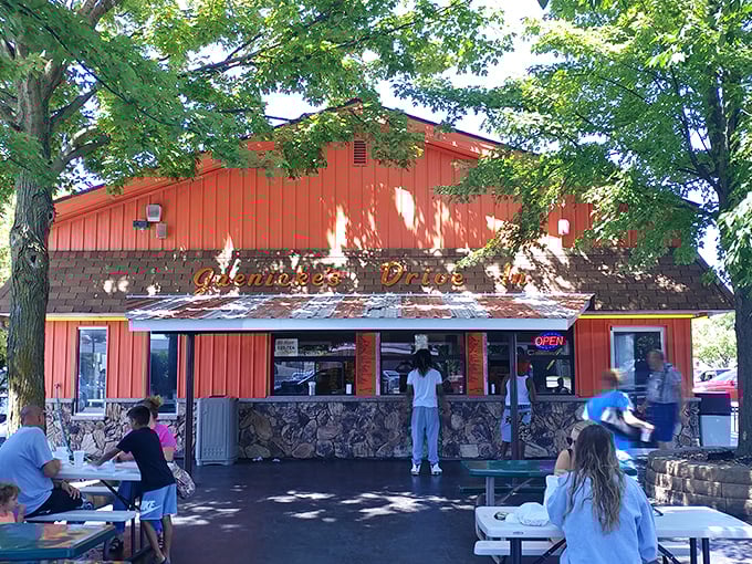 The summer scene at Jaenicke's—where picnic tables under shade trees become the stage for countless family memories and first dates.