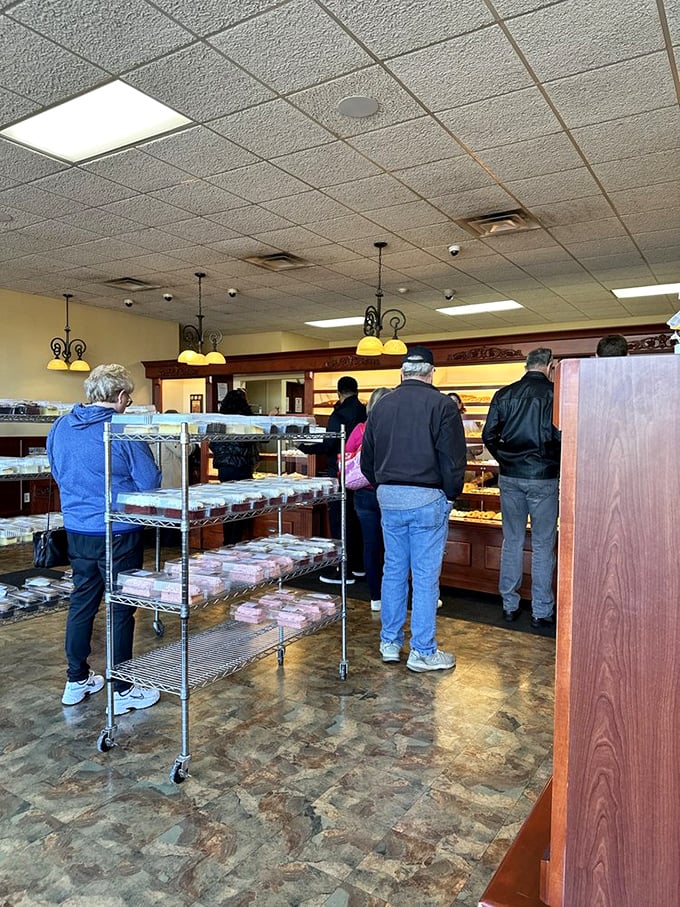 The universal language of waiting patiently for baked goods. These customers know that some things in life—like Resch's treats—are worth standing in line for.