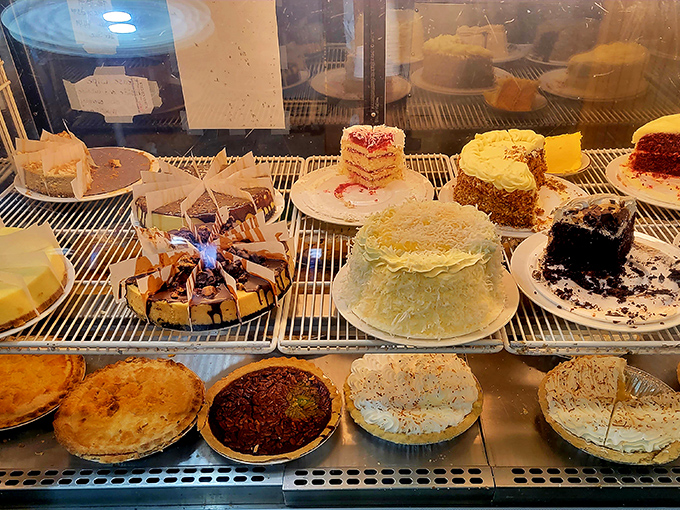 The dessert case – where willpower goes to die and "I'll just have a bite" becomes the lie we tell ourselves.