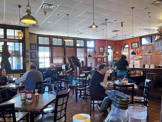The dining room hums with the satisfied murmurs of patrons experiencing what might be the highlight of their day before 10 AM.