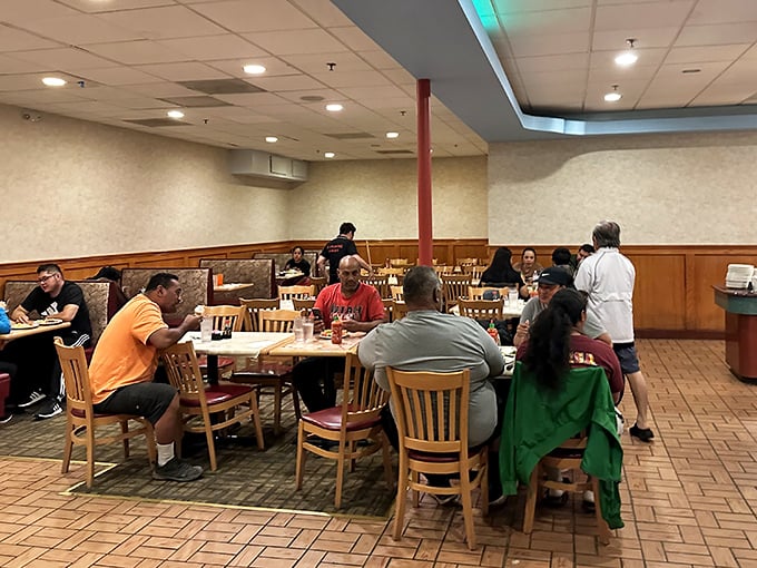 Real buffet aficionados know this scene well—that moment of quiet contemplation as fellow diners consider their next plate's strategic arrangement.