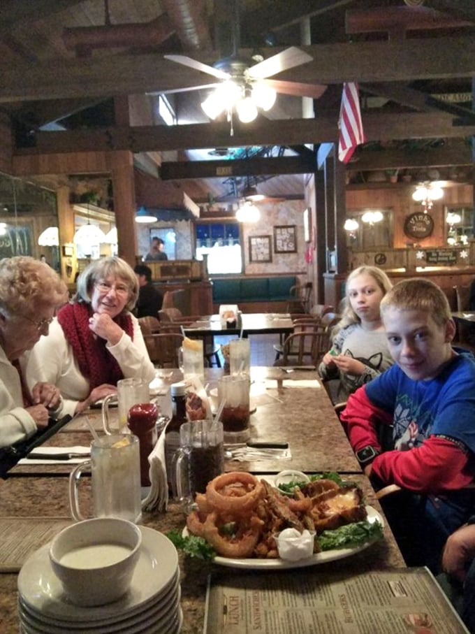 Multi-generational dining at its finest—where families gather around plates of comfort food and create memories between bites of crispy onion rings.