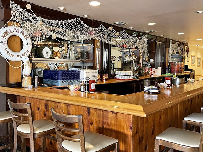 The counter where breakfast dreams come true. That nautical netting isn't just decor—it's a nod to the fresh seafood that graces many plates.