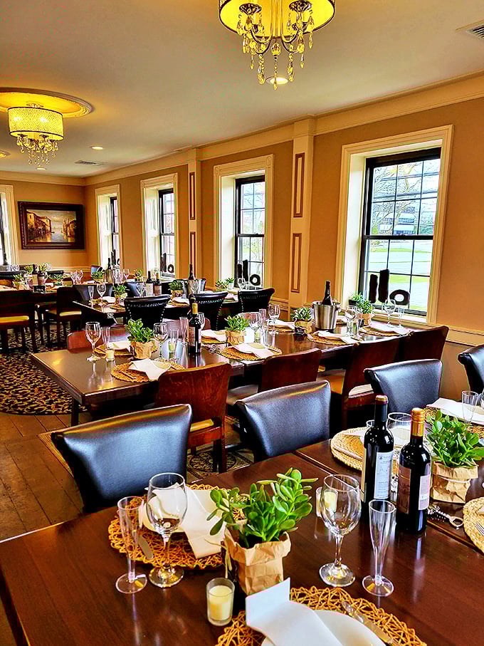 Golden light bathes tables set for celebration—this isn't just dinner, it's an occasion waiting for you to arrive.