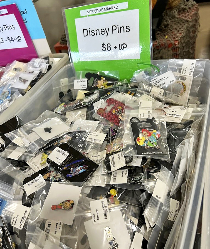 Disney pin trading paradise! Tiny treasures for the serious collector or casual fan, each plastic bag holding a miniature masterpiece of animated history.