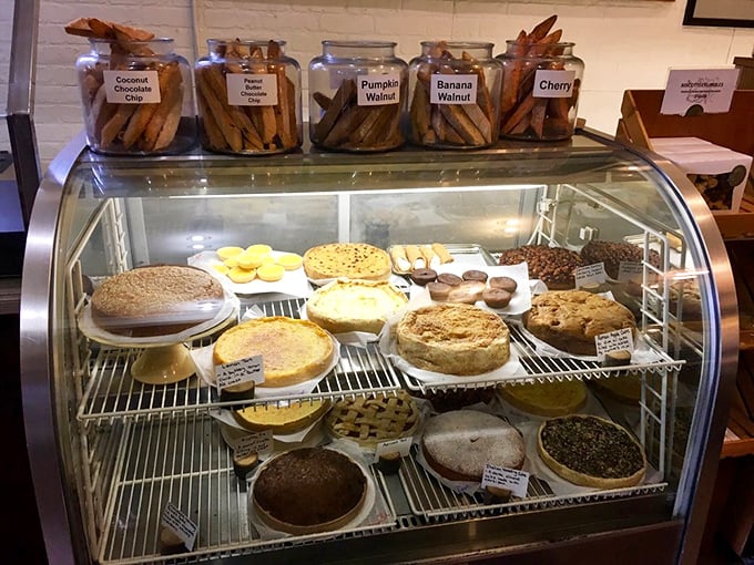 A display case that's essentially a museum of carbs—each pie and pastry more tempting than the last.