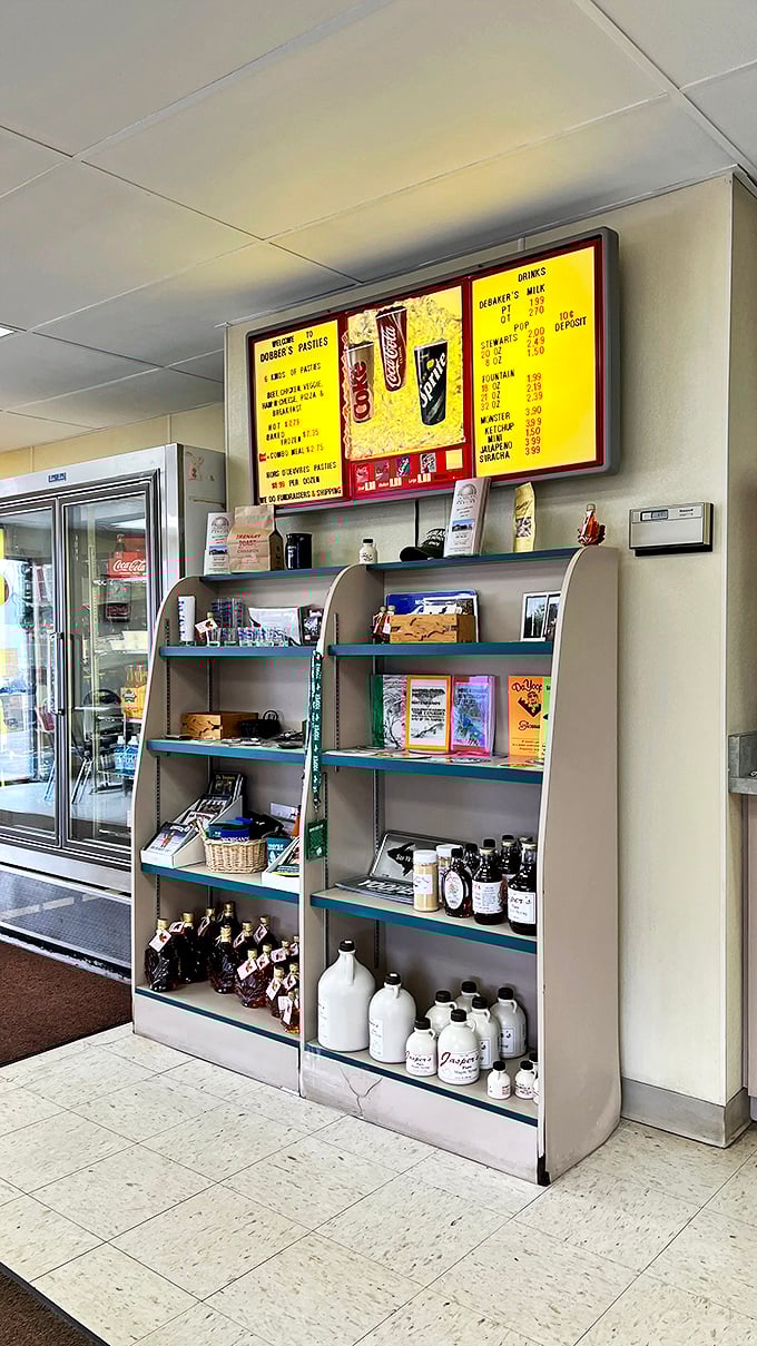 Local products line the shelves, offering the perfect accompaniments to your pasty feast—from maple syrup to specialty sodas.