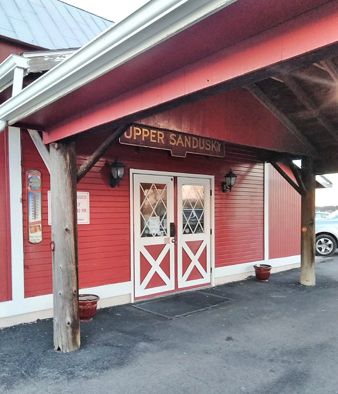 The barn-style entrance with its charming "X" doors practically whispers, "Come on in, the meat is fine."