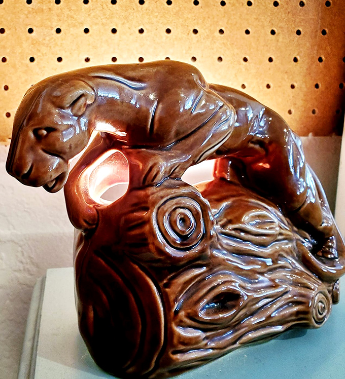 This ceramic panther lamp isn't just home decor—it's a conversation starter that silently judges your other, less interesting possessions.