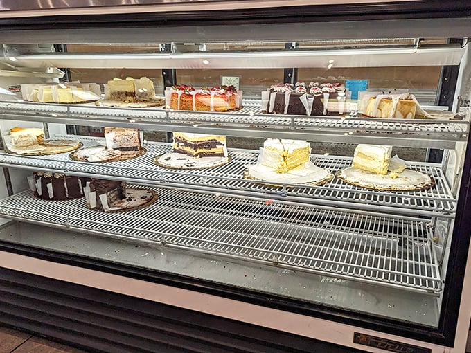 The dessert case – where willpower goes to die and "I'll just have coffee" turns into "and a slice of that chocolate cake, please."