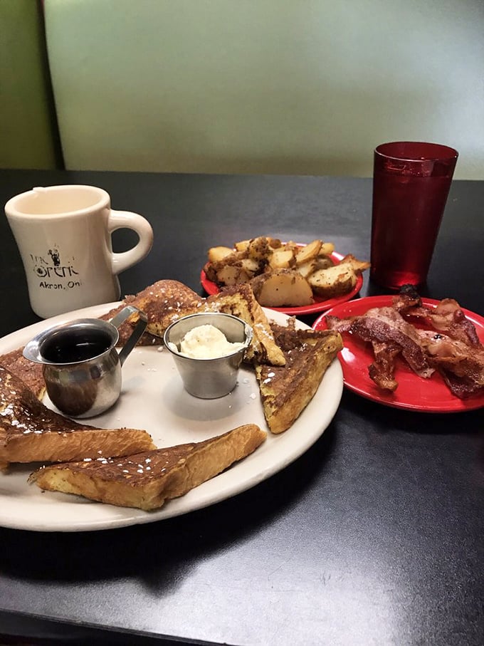French toast and bacon with all the fixings—the breakfast that makes you wonder why anyone would ever skip the most important meal.