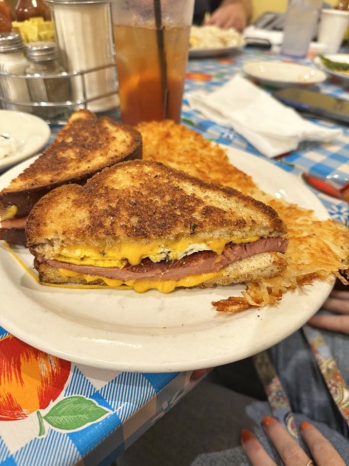 This sandwich proves that fried bologna deserves the same respect as prosciutto. The melty cheese is just showing off at this point.