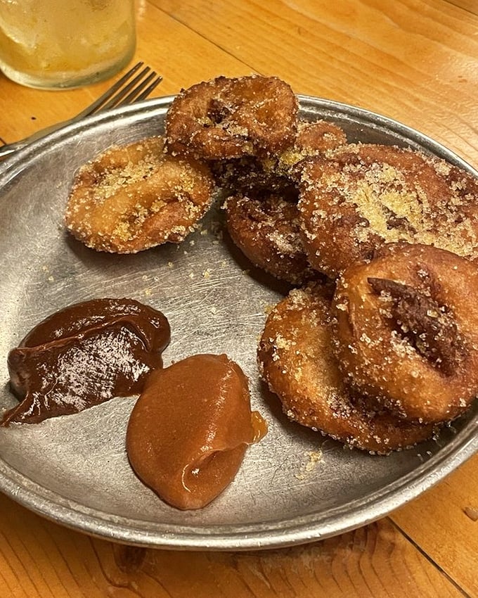 These fried fruit pastries dusted with sugar aren't just dessert—they're little time machines to childhood memories you didn't even know you had.