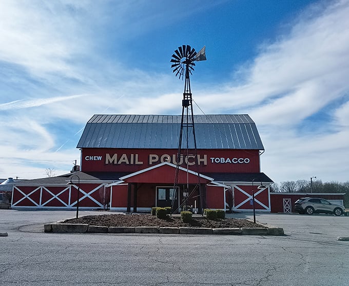 The windmill stands sentinel over this barn-turned-restaurant, a rural landmark that promises authentic flavors rather than pretentious fare.
