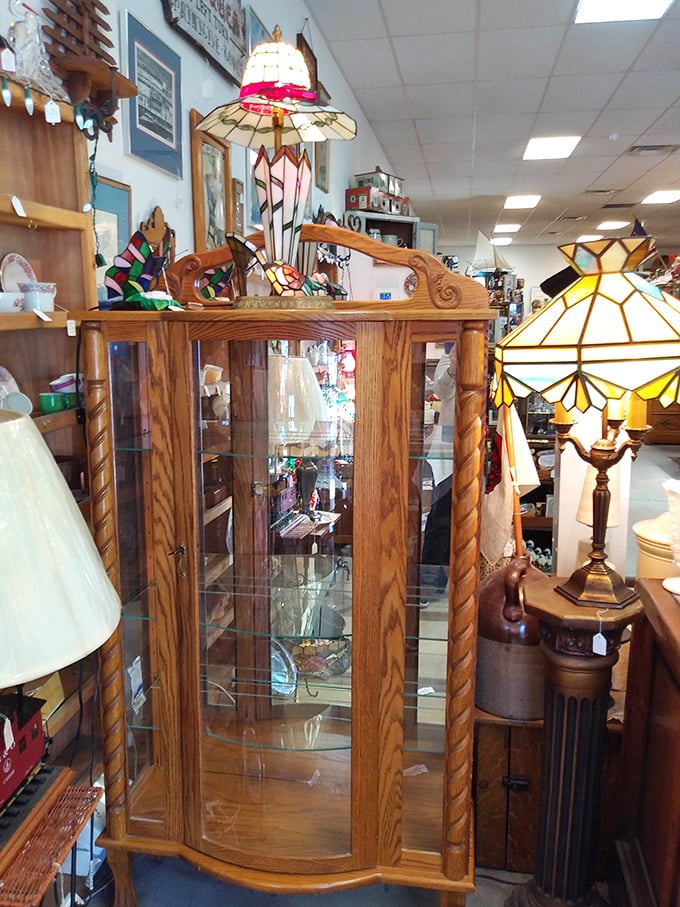 Carved wooden display cabinets that put modern furniture to shame – craftsmanship from an era when things were built to outlast their makers.