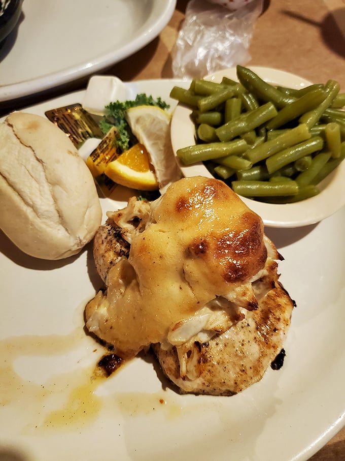 When chicken gets the royal treatment—grilled to perfection and crowned with melted cheese that cascades down like a delicious waterfall.