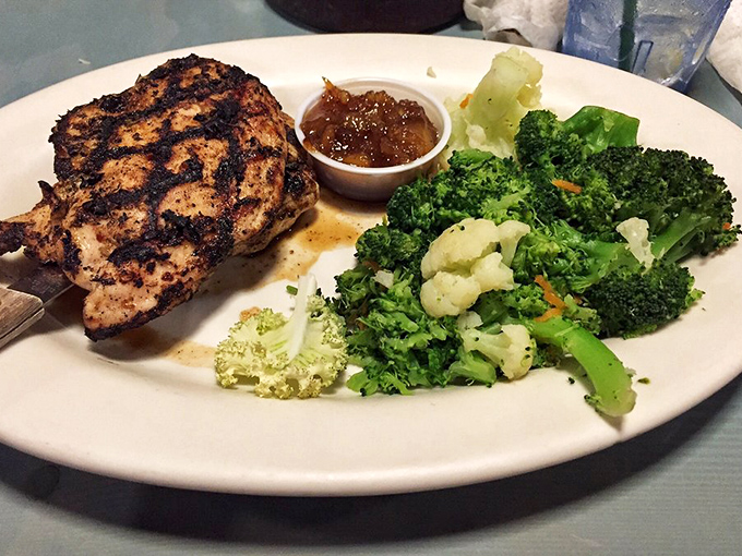 "Perfectly grilled chicken proves Rusty's isn't just about seafood – though those vegetables might steal the show with their vibrant freshness."