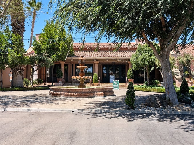Harris Ranch Resort's fountain courtyard creates a tranquil oasis, where retirement dreams don't require winning the lottery—just smart relocation choices.
