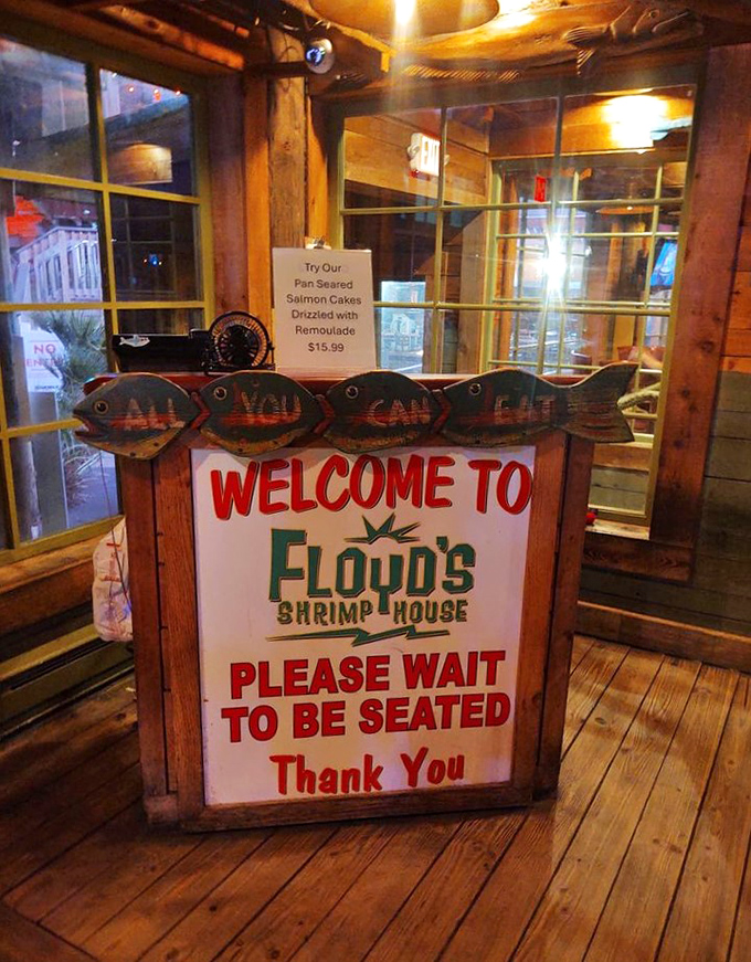 The welcoming host stand announces "ALL YOU CAN EAT" in fish-shaped signs – subtle it's not, effective it certainly is.