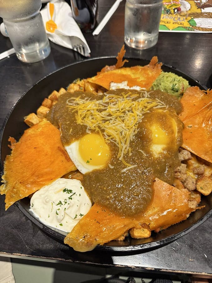 This skillet of huevos rancheros arrives with all the drama of a Broadway production—crispy tortillas, sunny eggs, and a supporting cast of toppings.