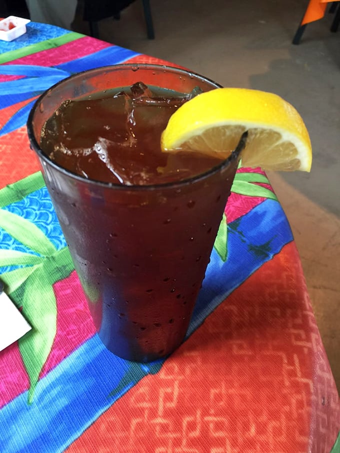 Even the iced tea gets the oceanfront treatment, served with a lemon slice and a side of harbor views.