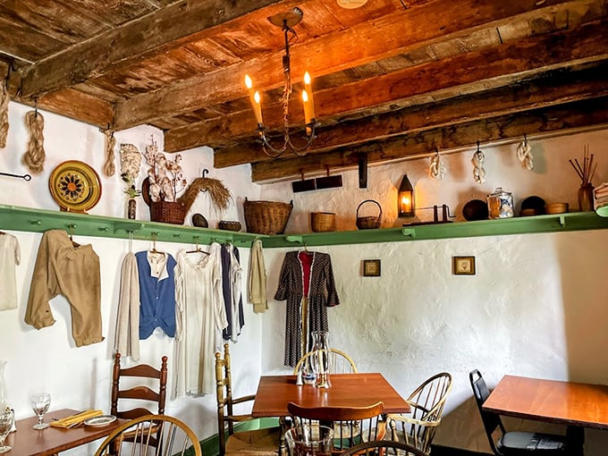 Not just decoration—these colonial garments and artifacts create an immersive dining experience where you can almost hear the whispers of revolutionary plans.