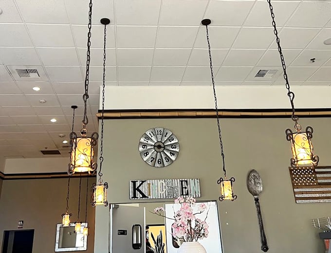 Vintage-inspired decor with "KITCHEN" spelled out in rustic letters – because sometimes you need a reminder of where the magic happens.