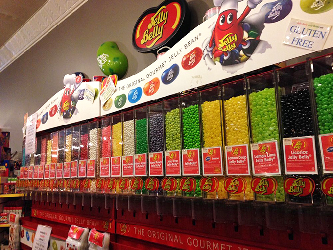 The Jelly Belly wall—where indecision becomes an art form and "just one flavor" becomes the biggest lie you'll tell yourself today.