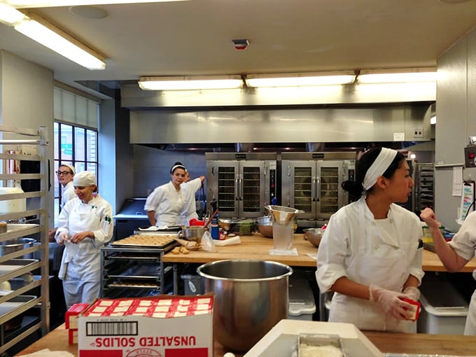 Behind the scenes, culinary magic happens with precision that would impress a Swiss watchmaker.