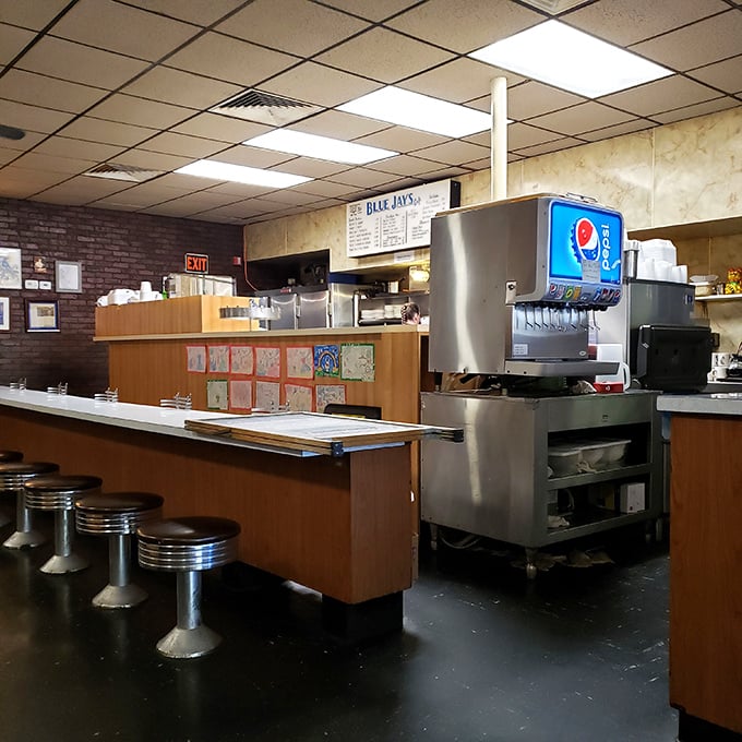 The beating heart of Blue Jay – a classic diner counter and kitchen where Cincinnati culinary magic has happened for generations.