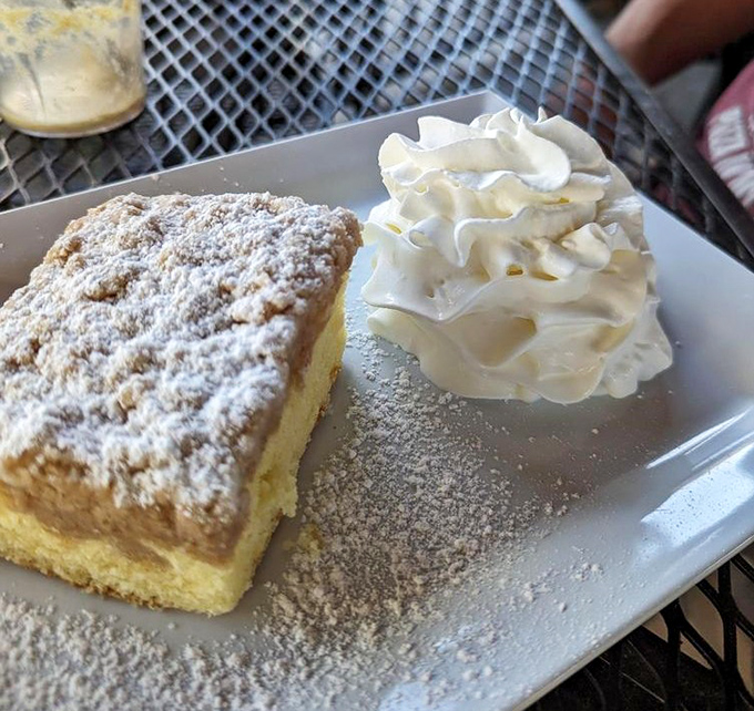 Sunshine on a plate—this lemon crumb cake with cloud-like whipped cream brightens even the grayest Pennsylvania morning.
