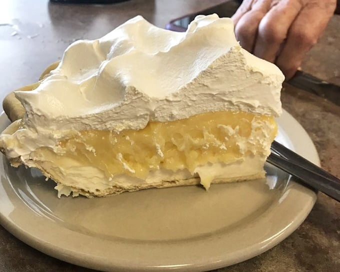 Lemon meringue pie with clouds of meringue so high they need FAA clearance – sunshine on a plate that brightens even the gloomiest day.