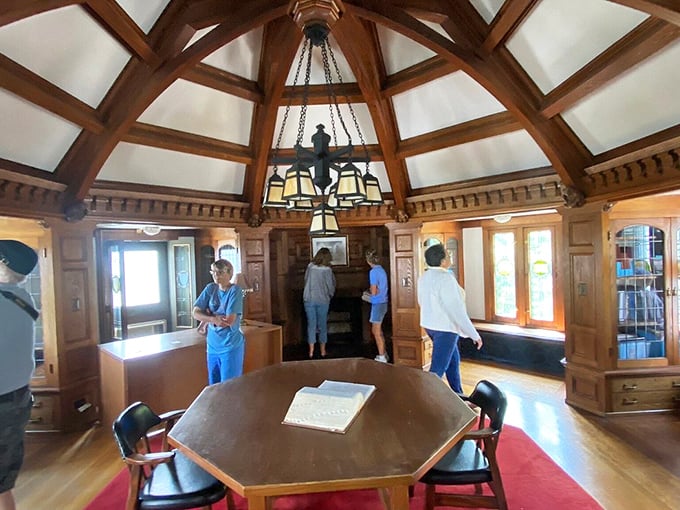 The octagonal library room, where important decisions were made—like which leather-bound classic to read next.