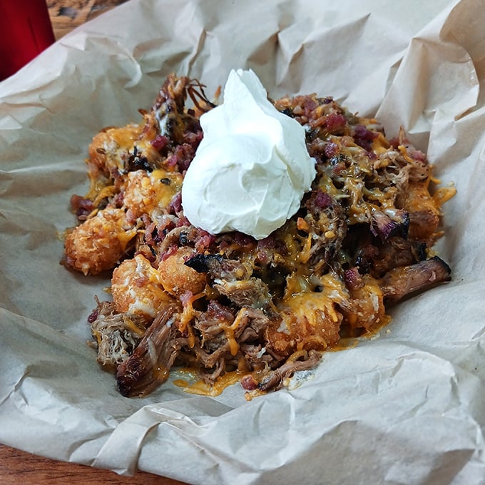Loaded tots that laugh in the face of moderation – a mountain of potatoes, meat, and cheese that requires both a fork and a strategy.