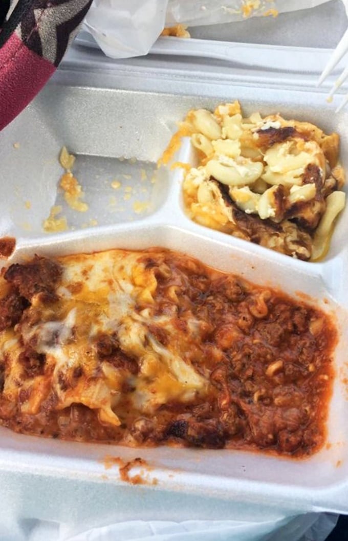 Comfort in a styrofoam container: where mac and cheese meets lasagna in a carb-loaded romance that feels like a warm hug.