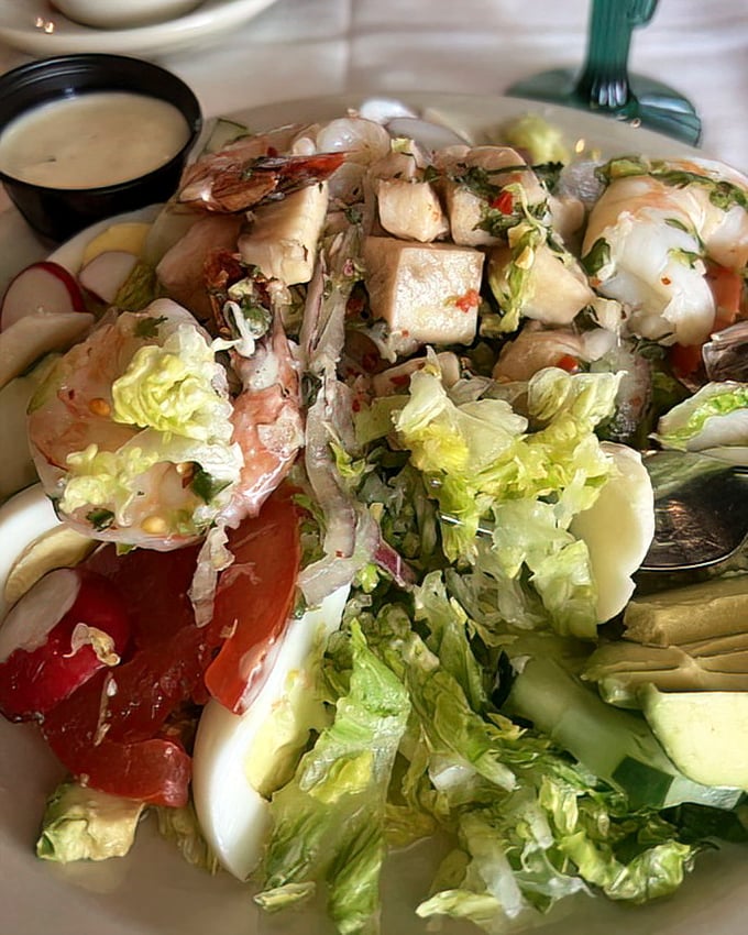 The Marisco Salad transforms "eating your greens" from obligation to privilege with its bounty of seafood atop crisp lettuce.